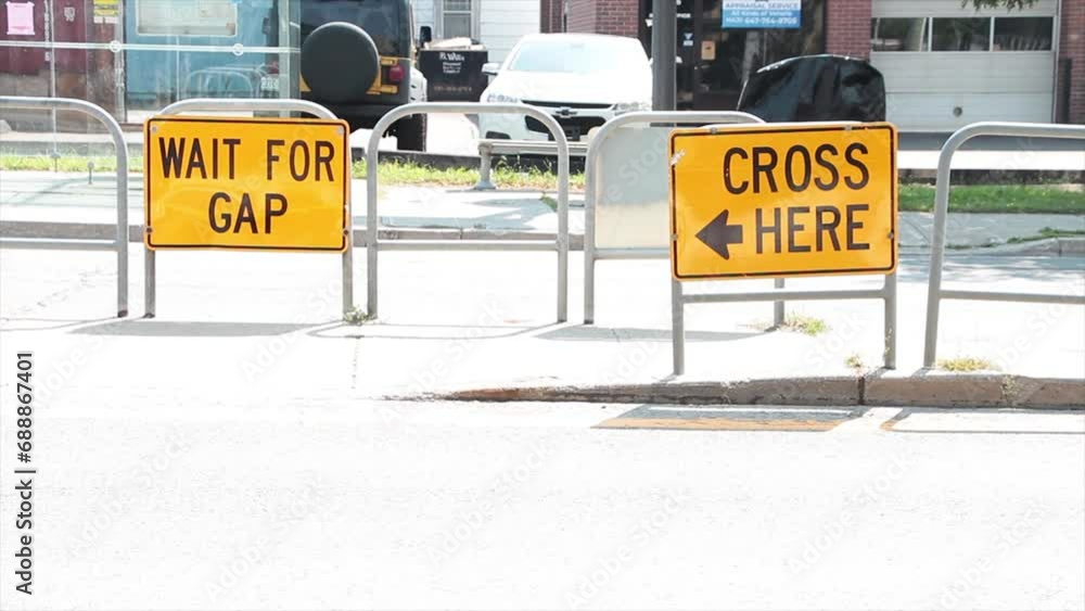 wait for gap and cross here with arrow writing caption text street road ...