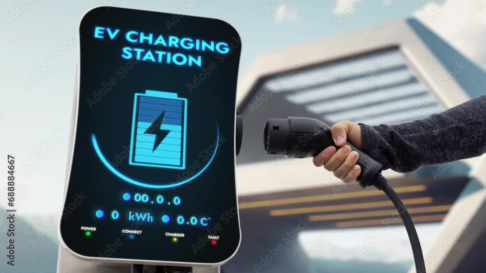Hand pull EV charger from smart electric charging station display ...