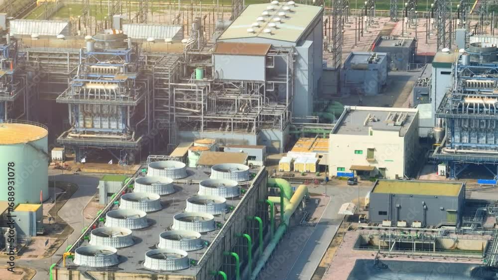 Aerial view of the power plant presents an intricate web of metal and ...