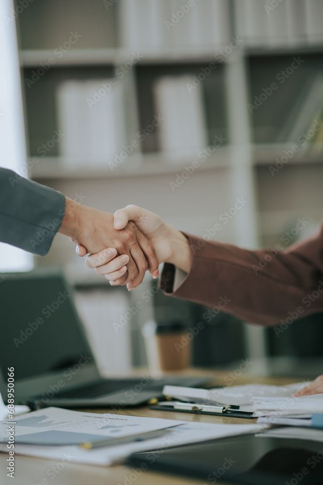 Business handshake for teamwork of business mergers and acquisitions ...