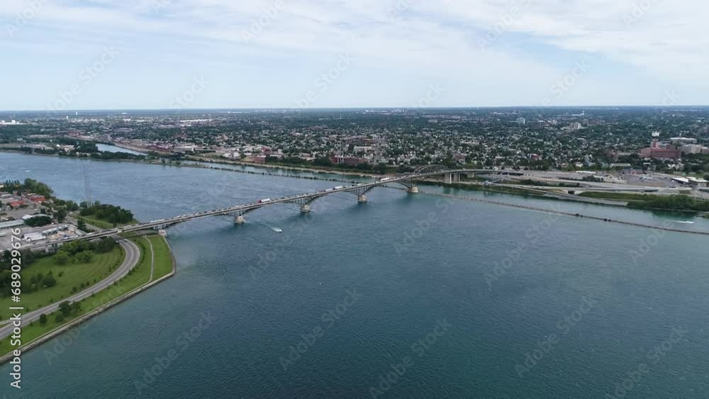 Drone captures footage of the Fort Erie Peace Bridge while a boat ...