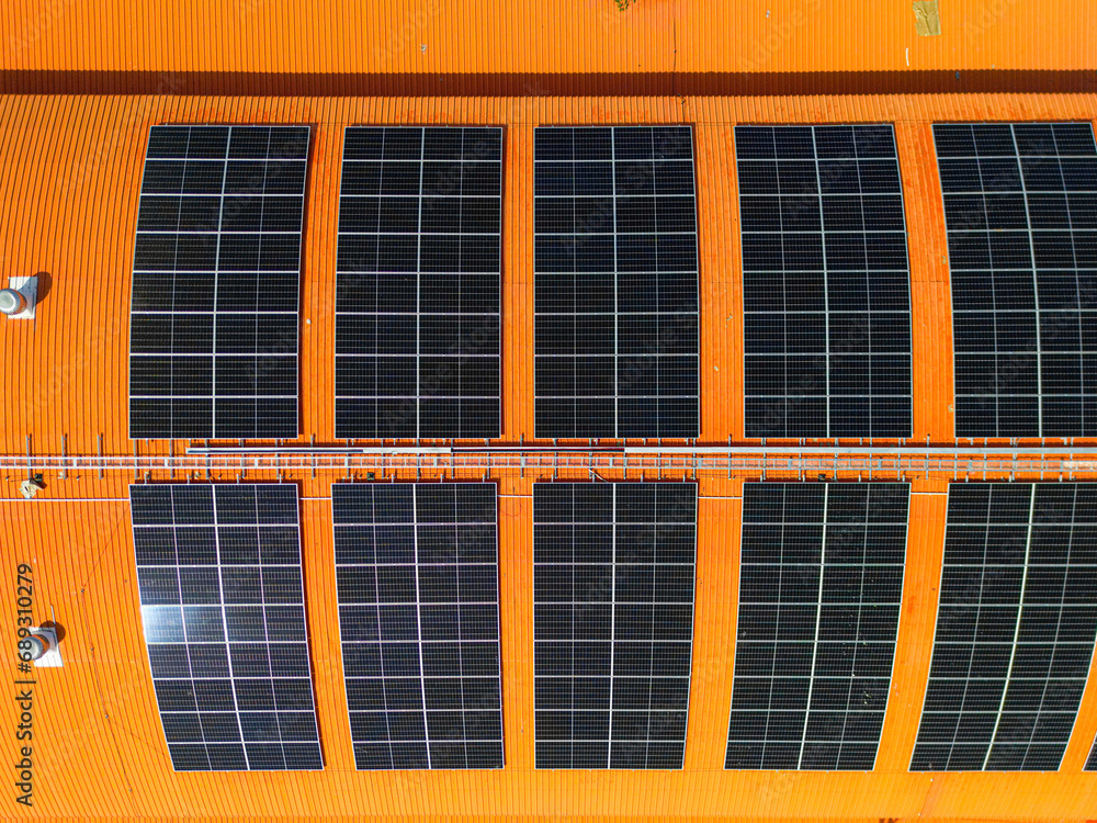 Top aerial view of solar roof system at the rooftop of factory ...