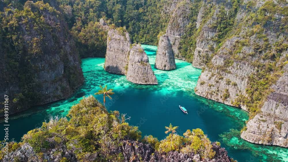 Aerial view of the South West Papua's seascape with blue lagoons and ...