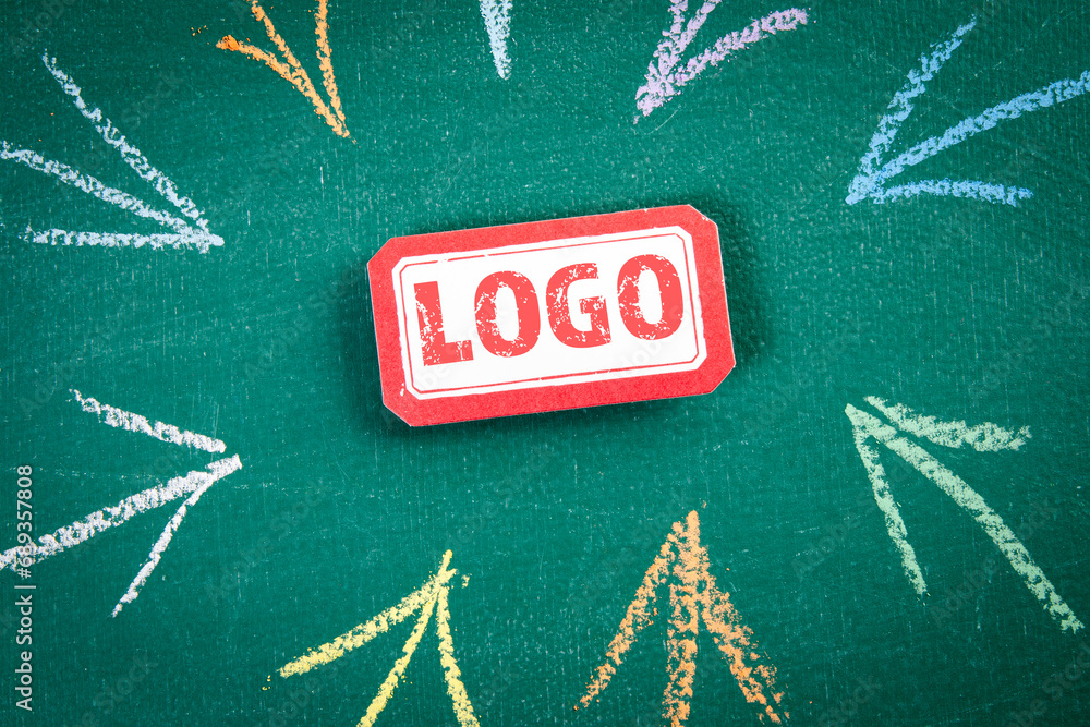 LOGO. Sticky note with text on a green chalkboard background Stock ...