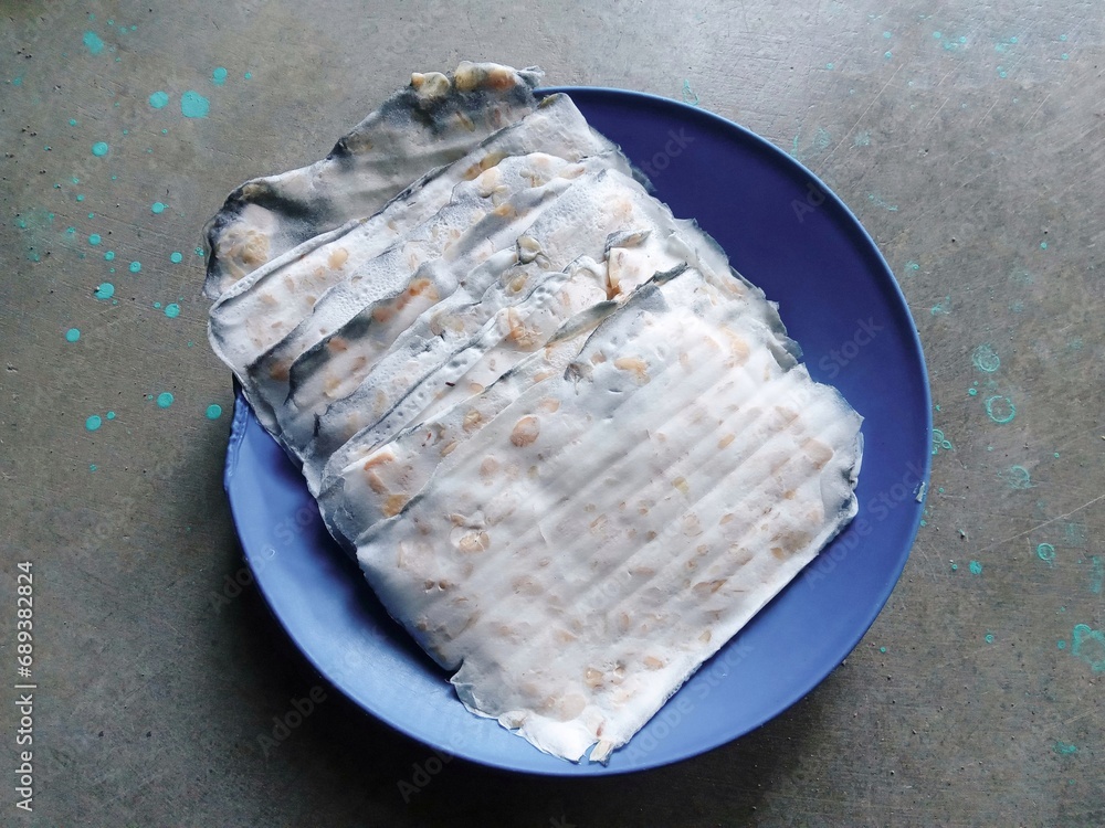 uncooked mendoan tempeh. tempeh or fermented soybeans for mendoan or ...