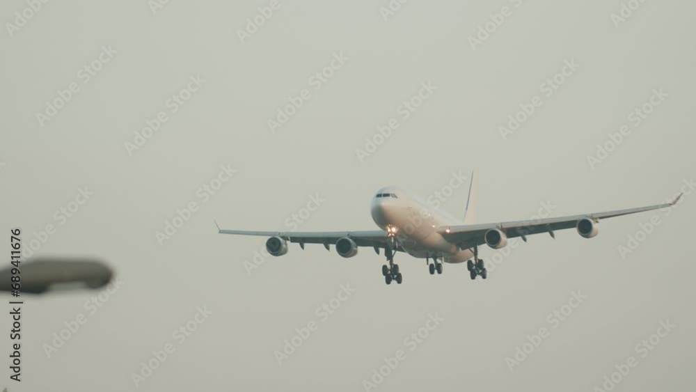Close-up of the flight of passenger airplane in the sky on low high ...