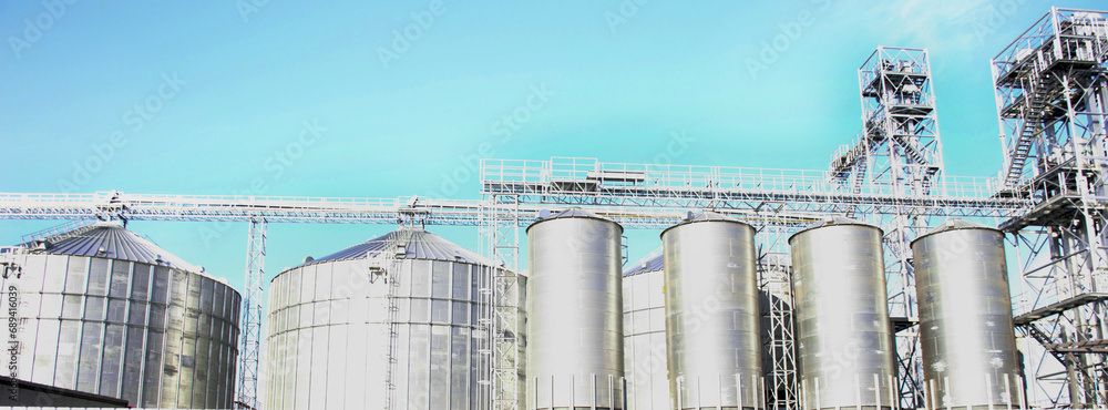 large metal containers of a modern elevator for drying and storing ...