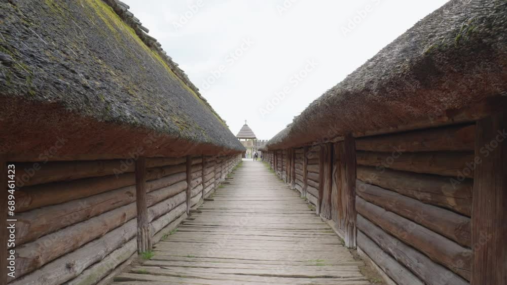 Rooftops Inside an archaeological site of Biskupin and a life-size ...
