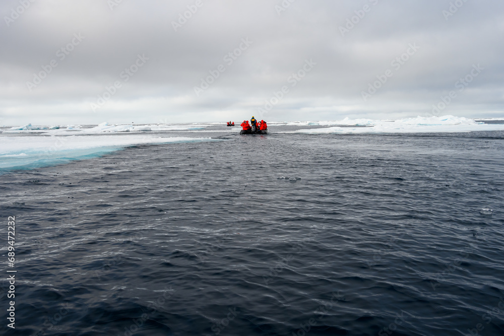 Eco tourism in the high arctic at the edge of the ice shelf in the ...