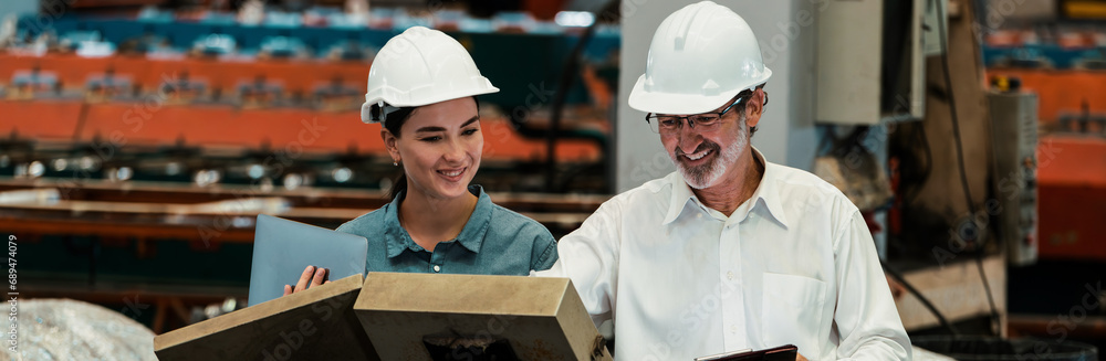 Metalwork manufacturing factory manager inspecting industrial steel ...
