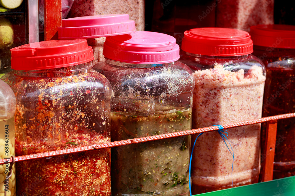 Rows of assorted authentic traditional khmer crack sauces called Chrouk ...