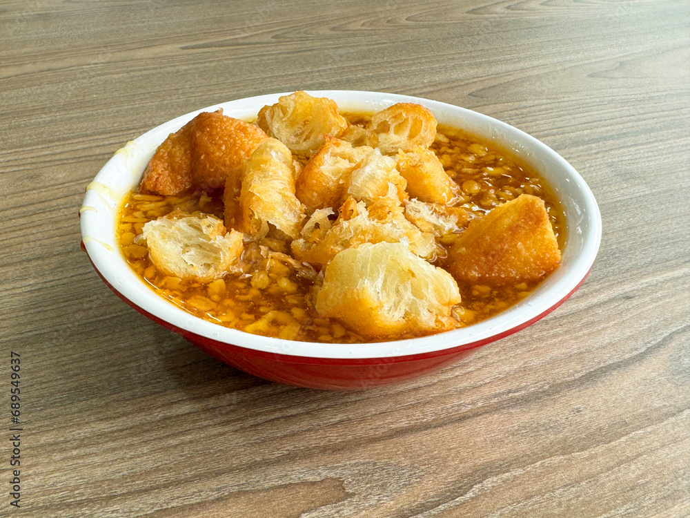 homemade boiled traditional Chinese hot tau suan sweet soup with deep ...