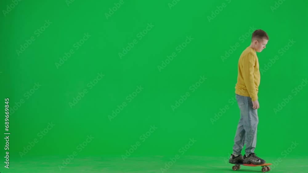 Portrait of boy on chroma key green screen. School boy kid in casual ...