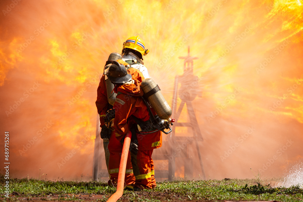 firefighter train fireman team extinguish spraying fire gas explosion ...