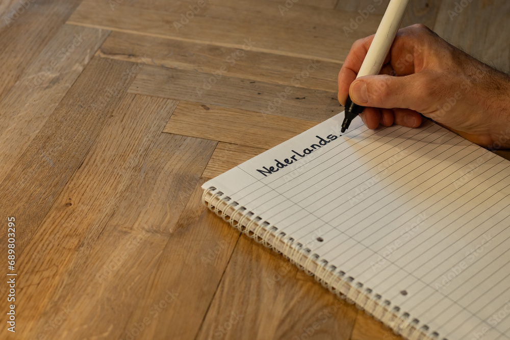 Blank notepad in class on wooden desk for student learning Dutch ...