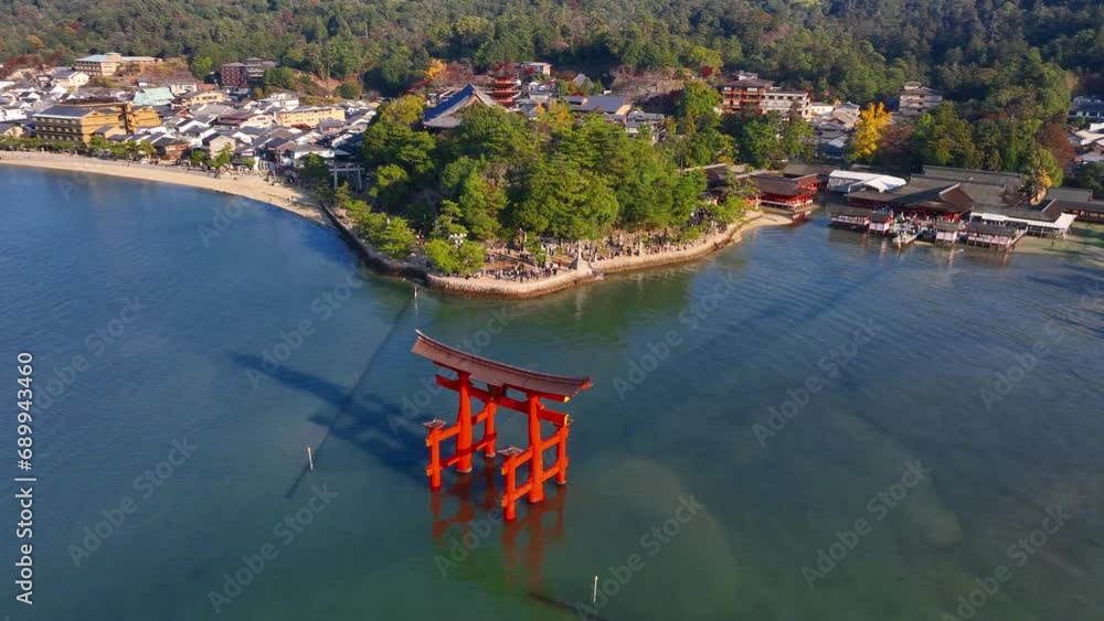 Japanese traditional red torii gate at sea, floating torii of Miyajima ...