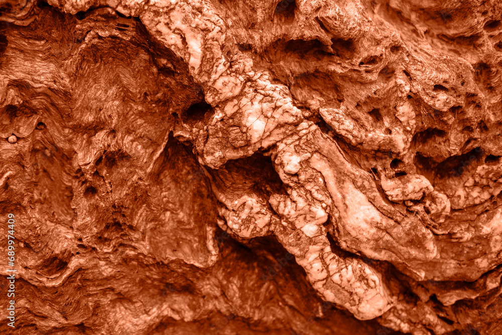 Stone texture with a wave-like pattern in a beautiful peach color ...