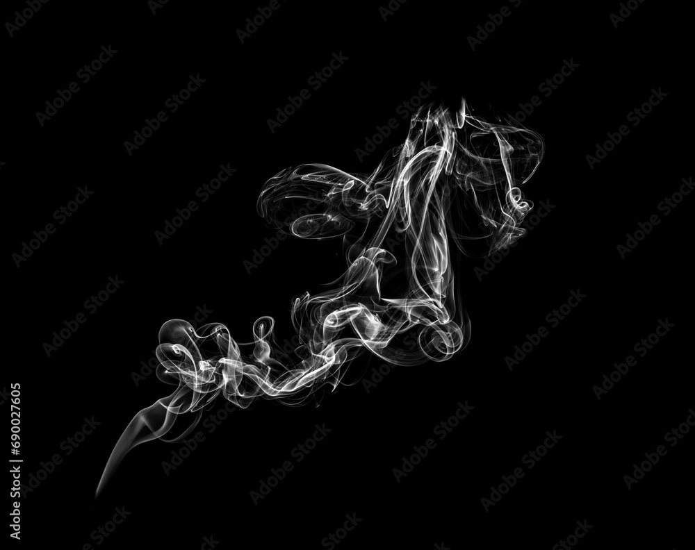 Abstract white puffs of smoke swirl overlay on black background ...