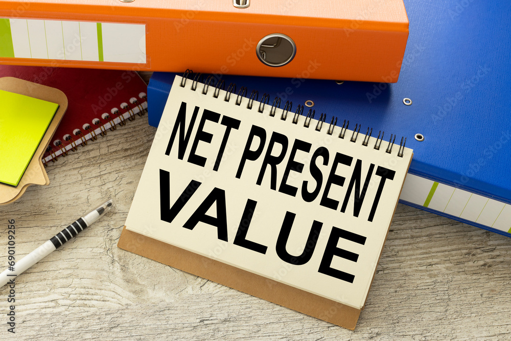 Net present value (NPV) text on the page. notepad on paper folder Stock Photo | Adobe Stock