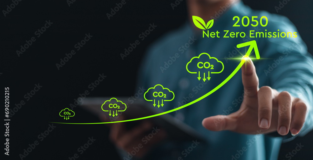 Net zero emissions by 2050. Businessman touching climate growth arrow ...