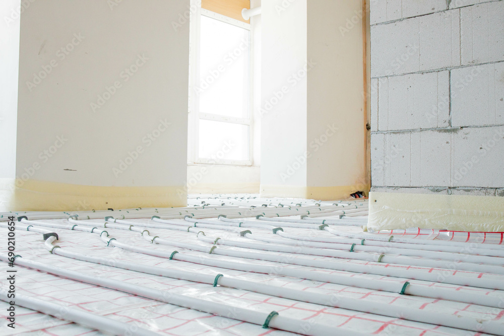 Installation of underfloor heating pipes for water heating. Heating ...