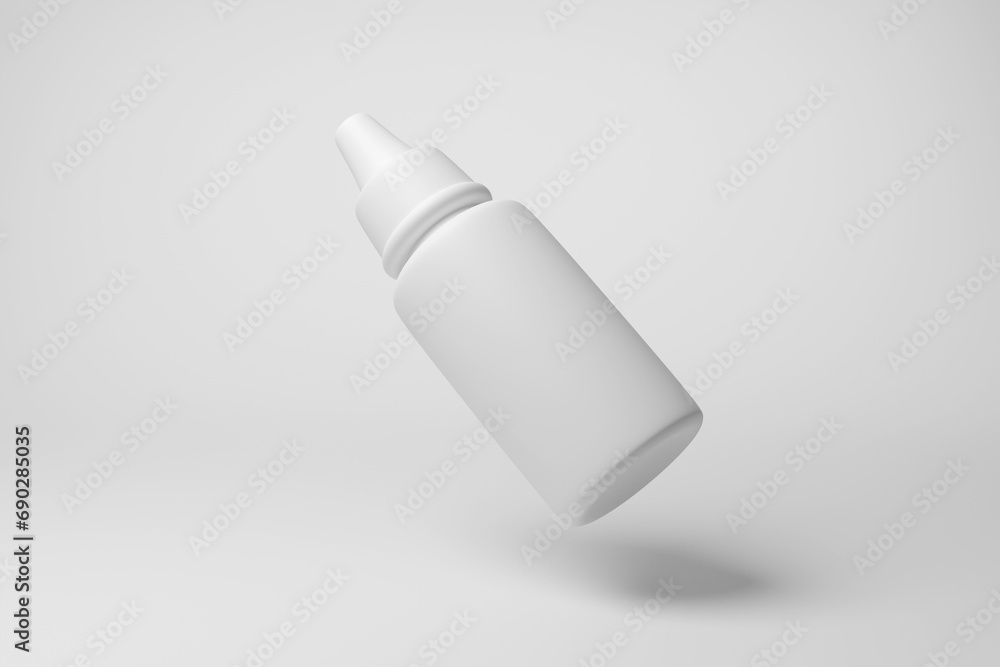 White eye drop bottle floating in mid air on white background in ...