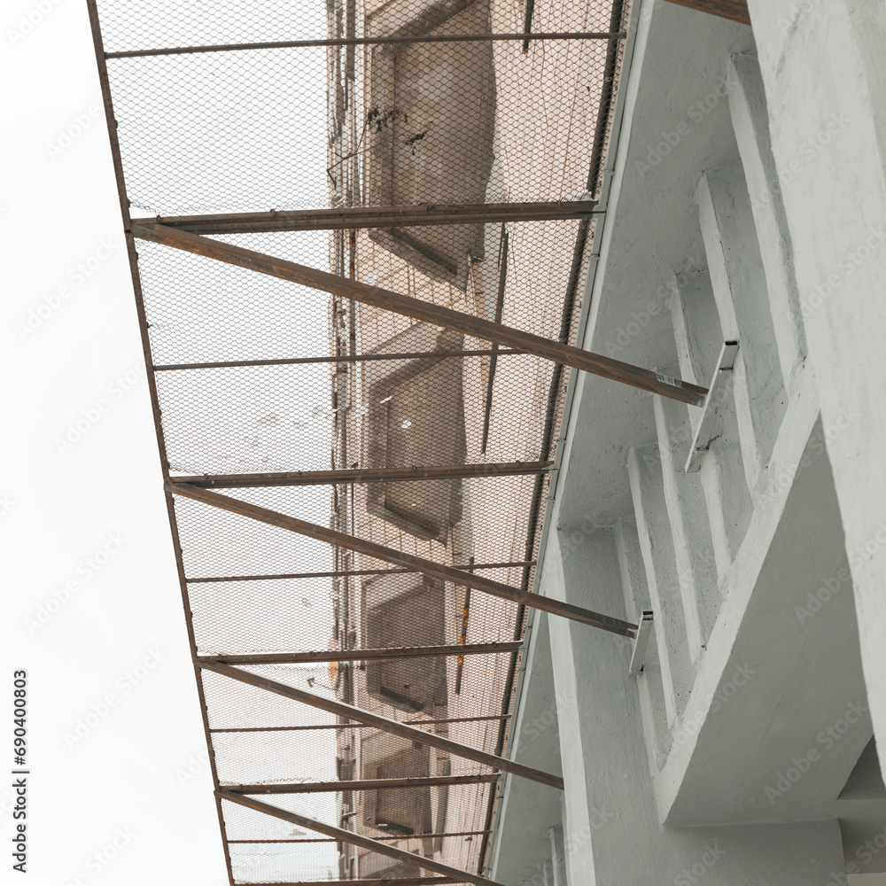 Safety net on the wall of a building to protect against falling objects ...