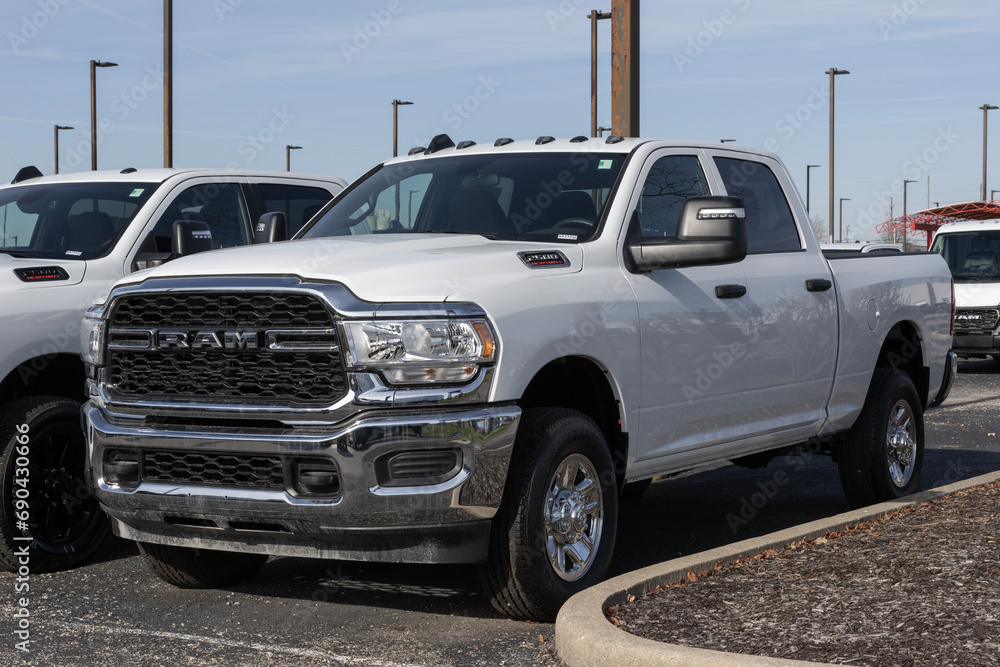 Ram 2500 Crew Cab display at a Stellantis dealership. Ram offers the ...