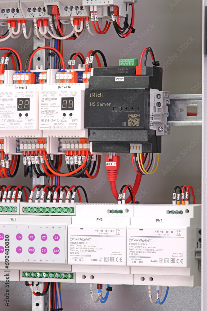 Electronic control modules for apartment automation are installed in an ...
