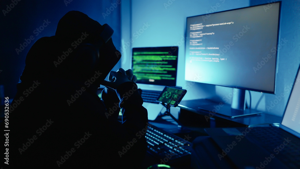 Hacker Working On Laptop At Night In The Modern Workspace Hacker Or