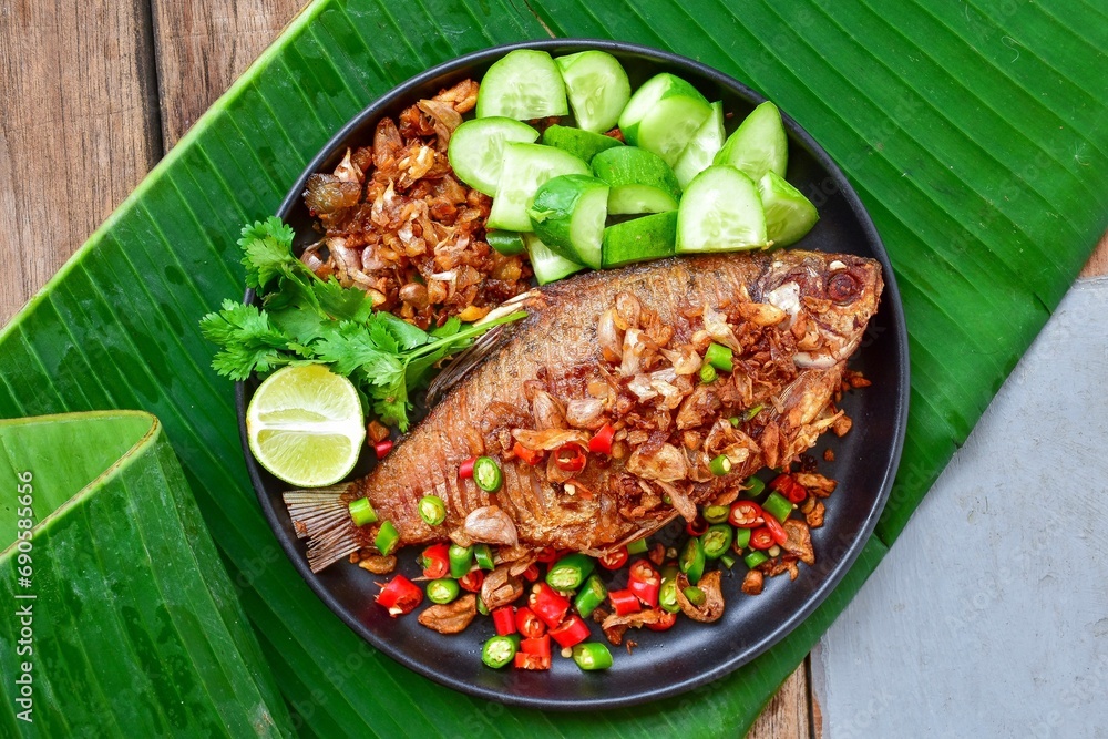 fried fish,Garlic fried fish,pikled fish, top view food table, With ...