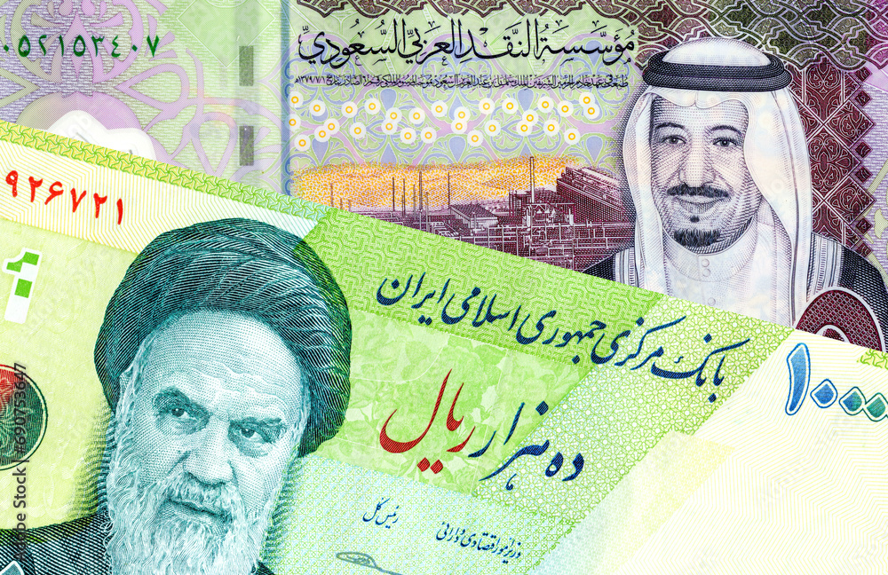 Saudi Arabia Riyal banknote with King Salman and Iranian rial banknote ...