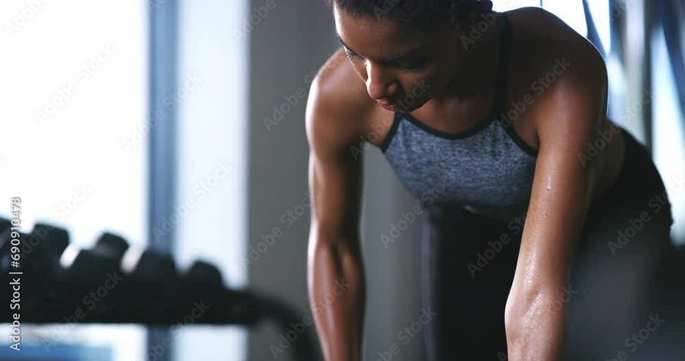 Dumbbell row, strong woman and arm training, muscular strength ...