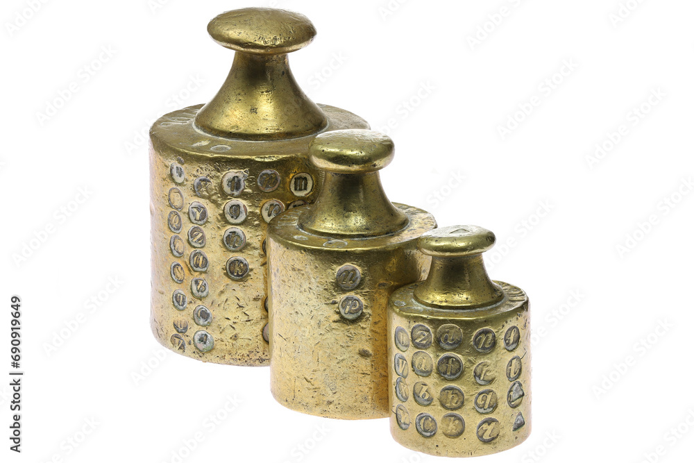vintage brass weights with several calibration hallmarks isolated on ...