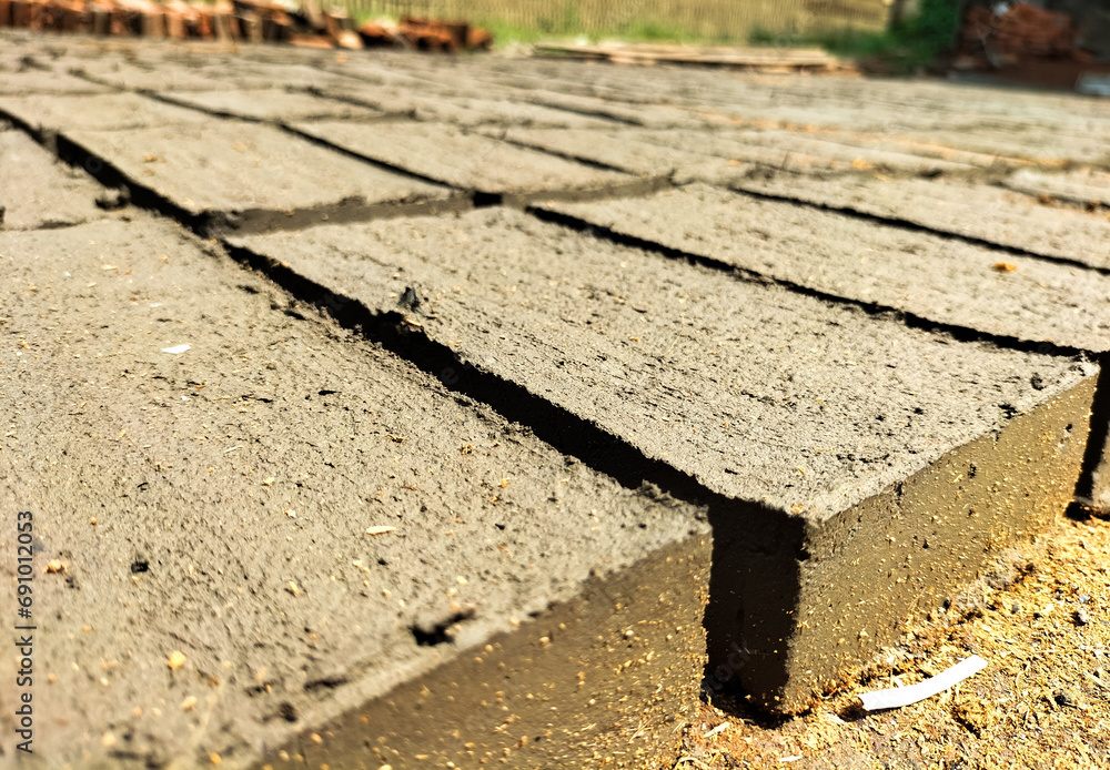 Production of homemade bricks from a mixture of clay and straw in Tegal ...