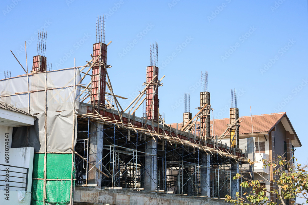 Construction site safety barriers. Plastic barriers on wooden frames ...