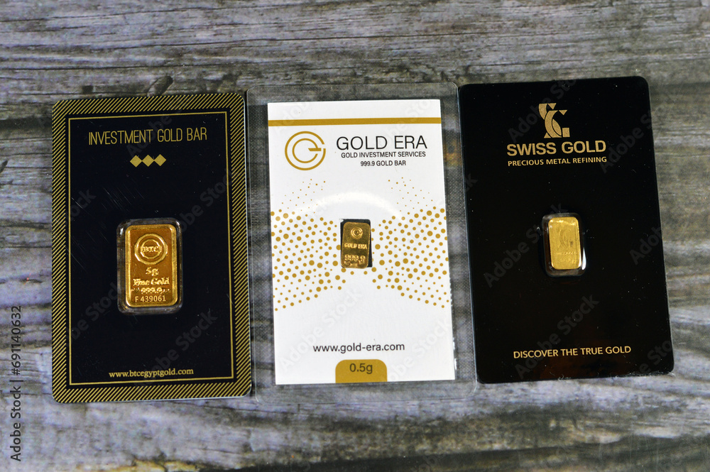 Cairo, Egypt, December 10 2023: BTC, Swiss Gold, Gold Era 24 Karate ...