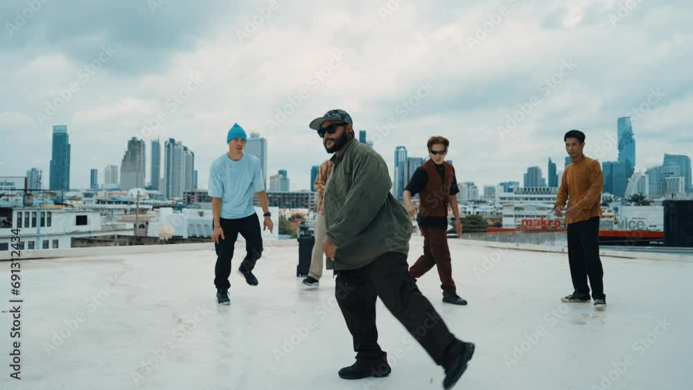 Professional break dance team practice B-boy dance while multicultural ...