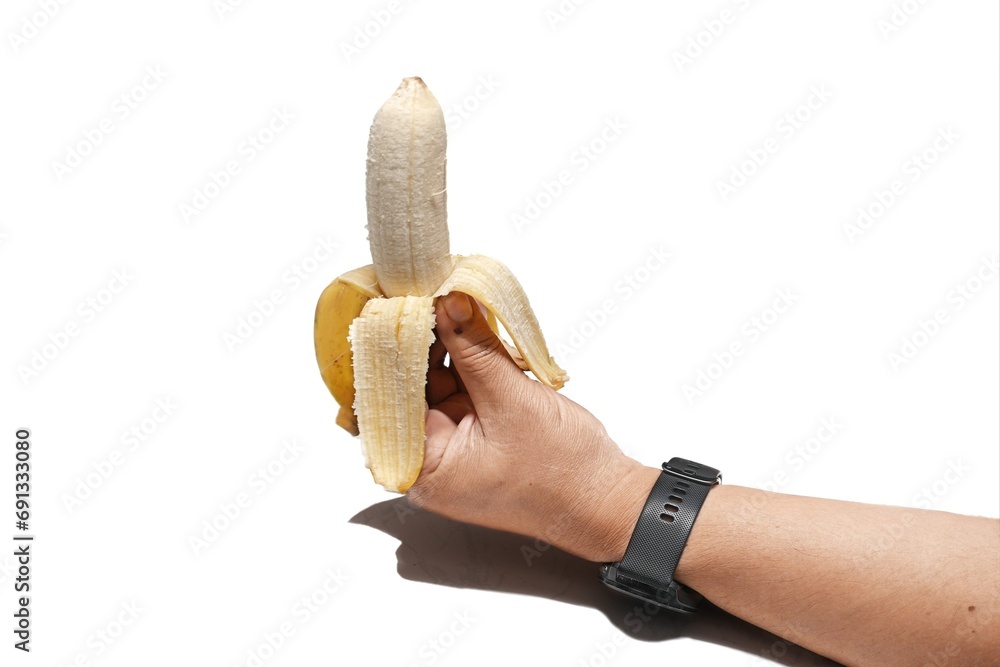 Use your hands to hold a peeled banana. on a white background Stock ...