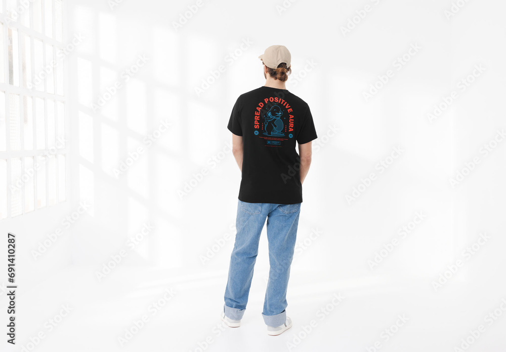 Mockup of man wearing customizable t-shirt and cap, from behind Stock ...