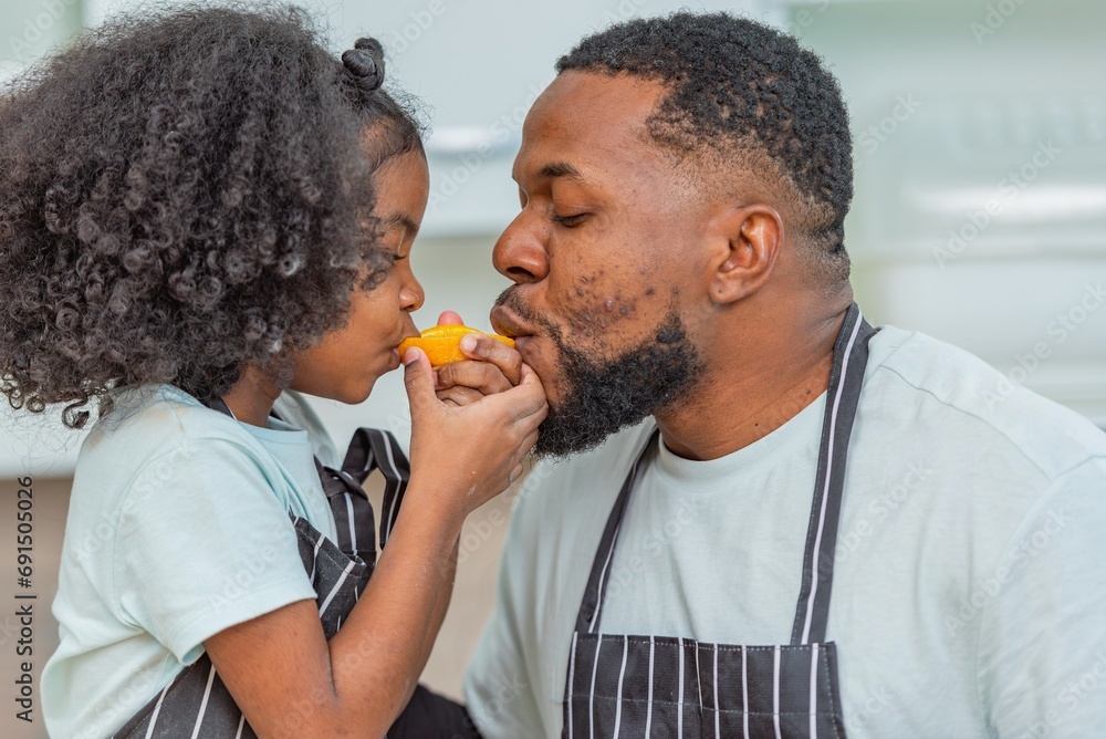 african afro hair black kid Cute taste oranges citrus sour flavour on ...