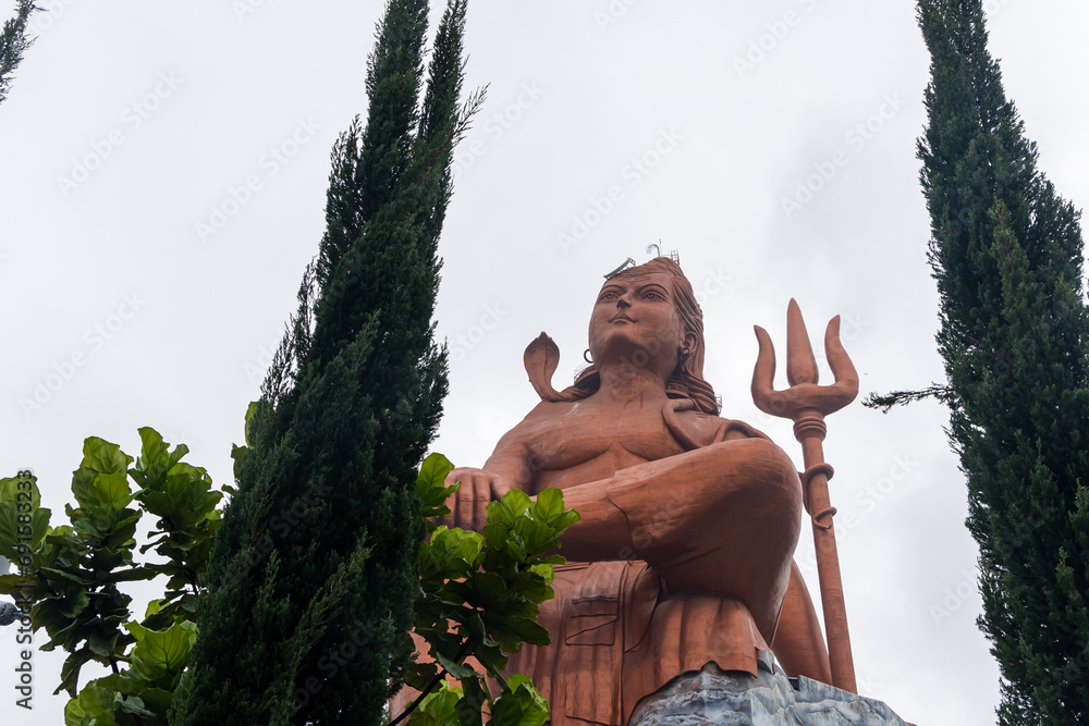 hindu god lord shiva isolated statue with bright background at morning ...