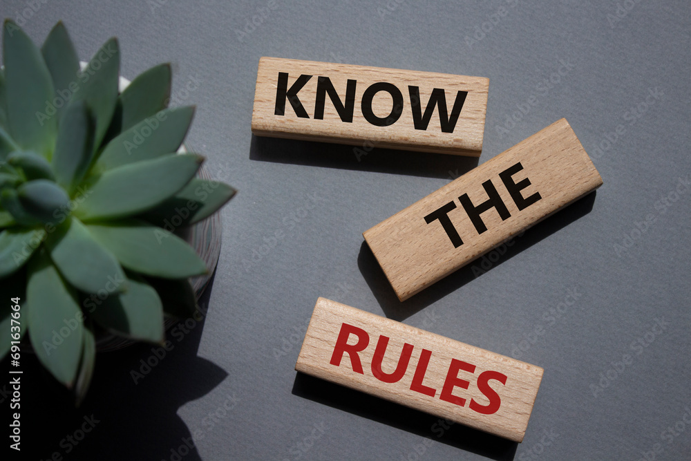 Know the rules symbol. Wooden blocks with words Know the rules ...