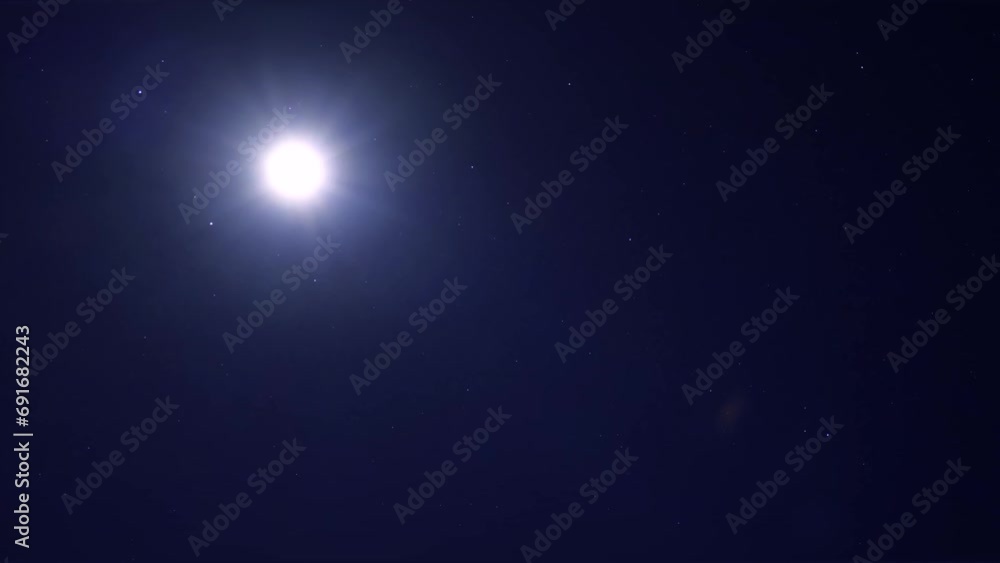 Time lapse captures moon's journey across star filled sky Moon and ...