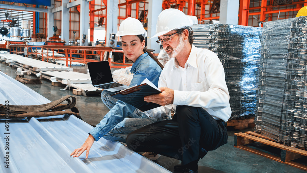 Metalwork manufacturing factory manager inspect newly manufactured ...