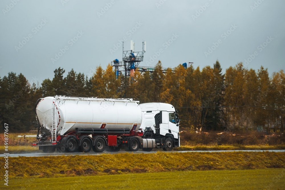 Liquid Fuel and Oil Cargo Semi Truck on the Highway. Compressed Gas ...