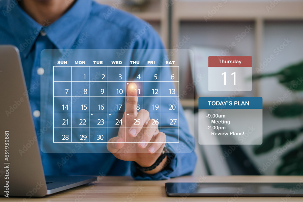 Time management concept.2024 Calendar event planner.Businessman manages ...
