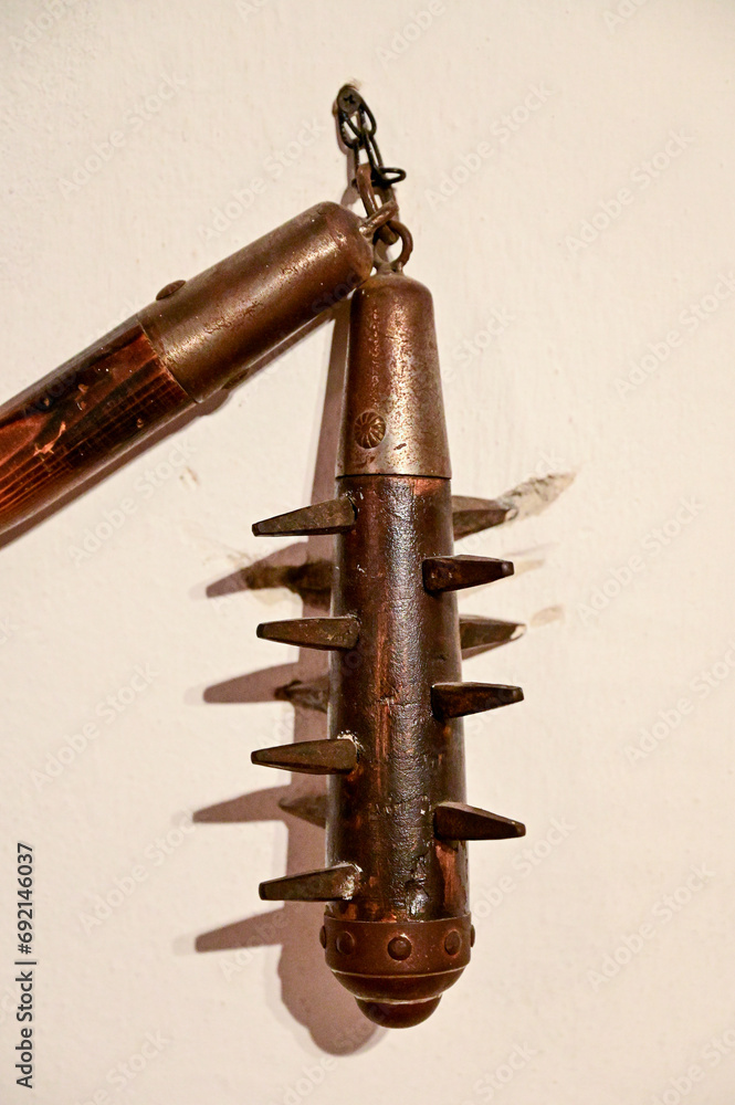 Ancient weapons displayed on a wall in the Dracula Castle, Bran Castle ...