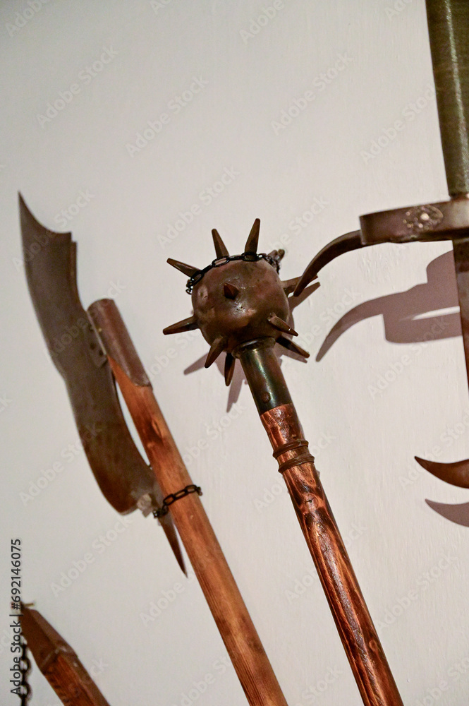 Ancient weapons displayed on a wall in the Dracula Castle, Bran Castle ...