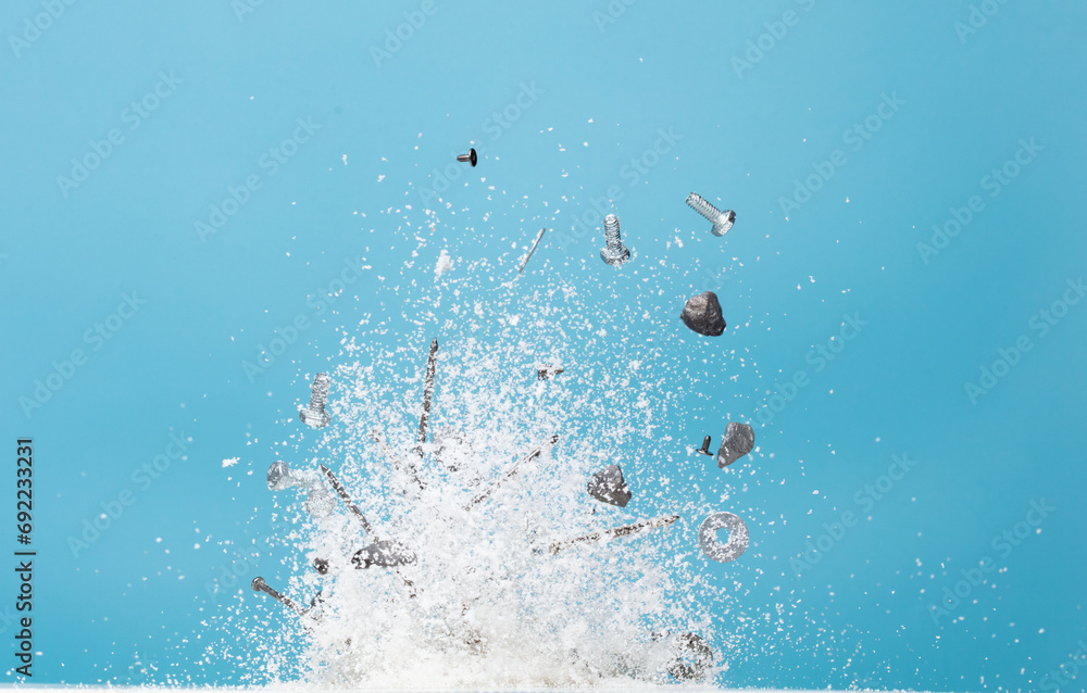 Nail spike Nut bolts sharp object rock stone under snow on road roof ...